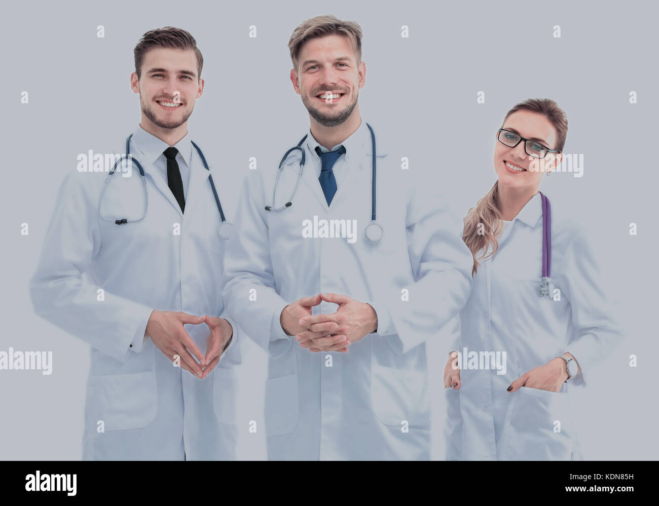 Team of medical professionals looking at camera, smiling Stock Photo ...