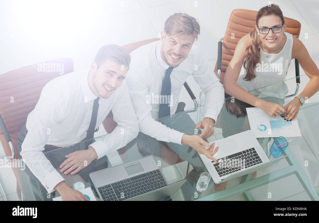 Three successful business person. High view Stock Photo - Alamy