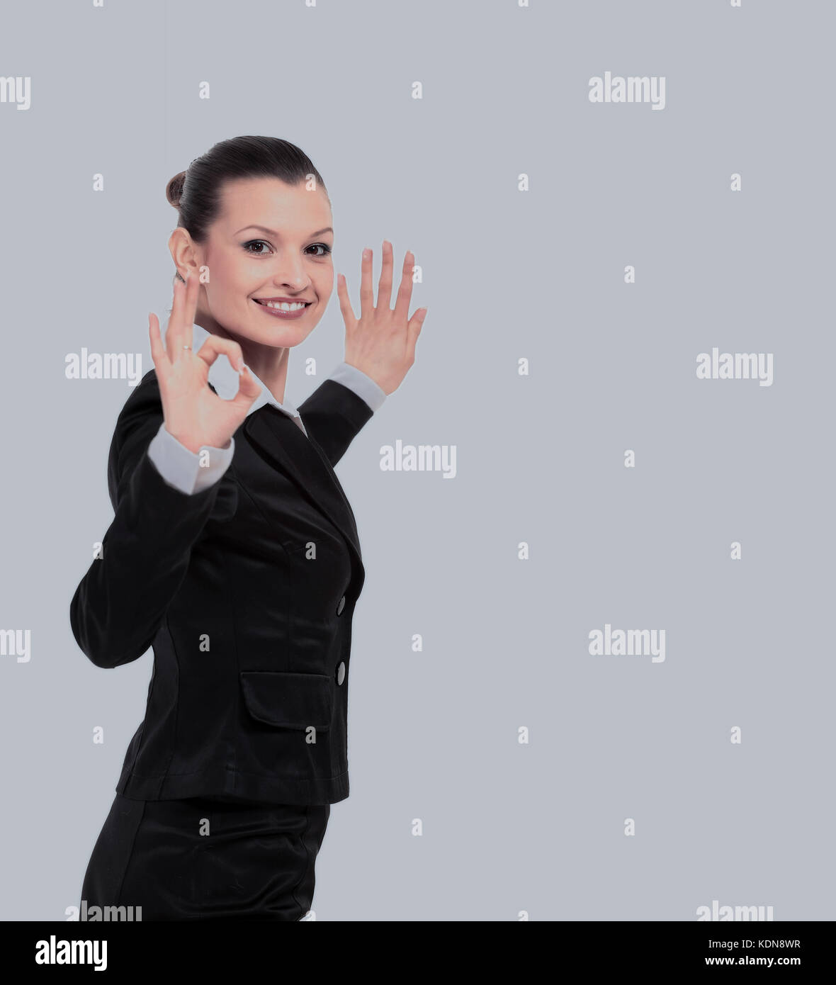 Attractive business woman is showing okay sign with happiness Stock ...