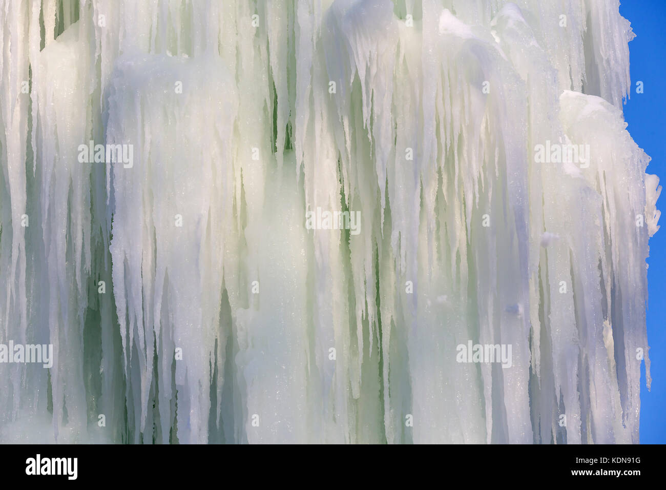 Background from a frozen waterfall of ice large icicles Stock Photo - Alamy