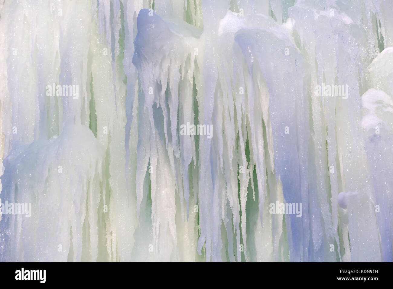 Background from a frozen waterfall of ice large icicles Stock Photo - Alamy