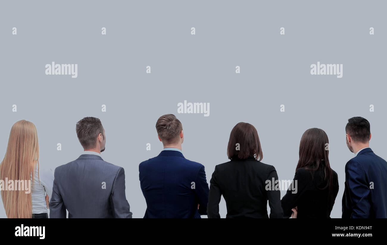 Successful business team looking upwards standing back side Stock Photo ...