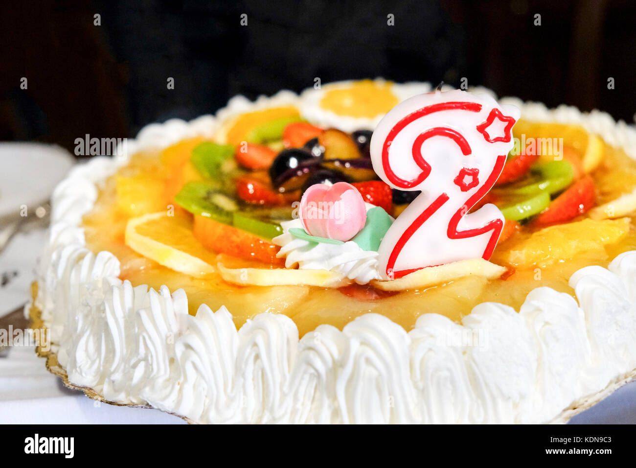 two years birthday cake candle number 2 two Stock Photo - Alamy