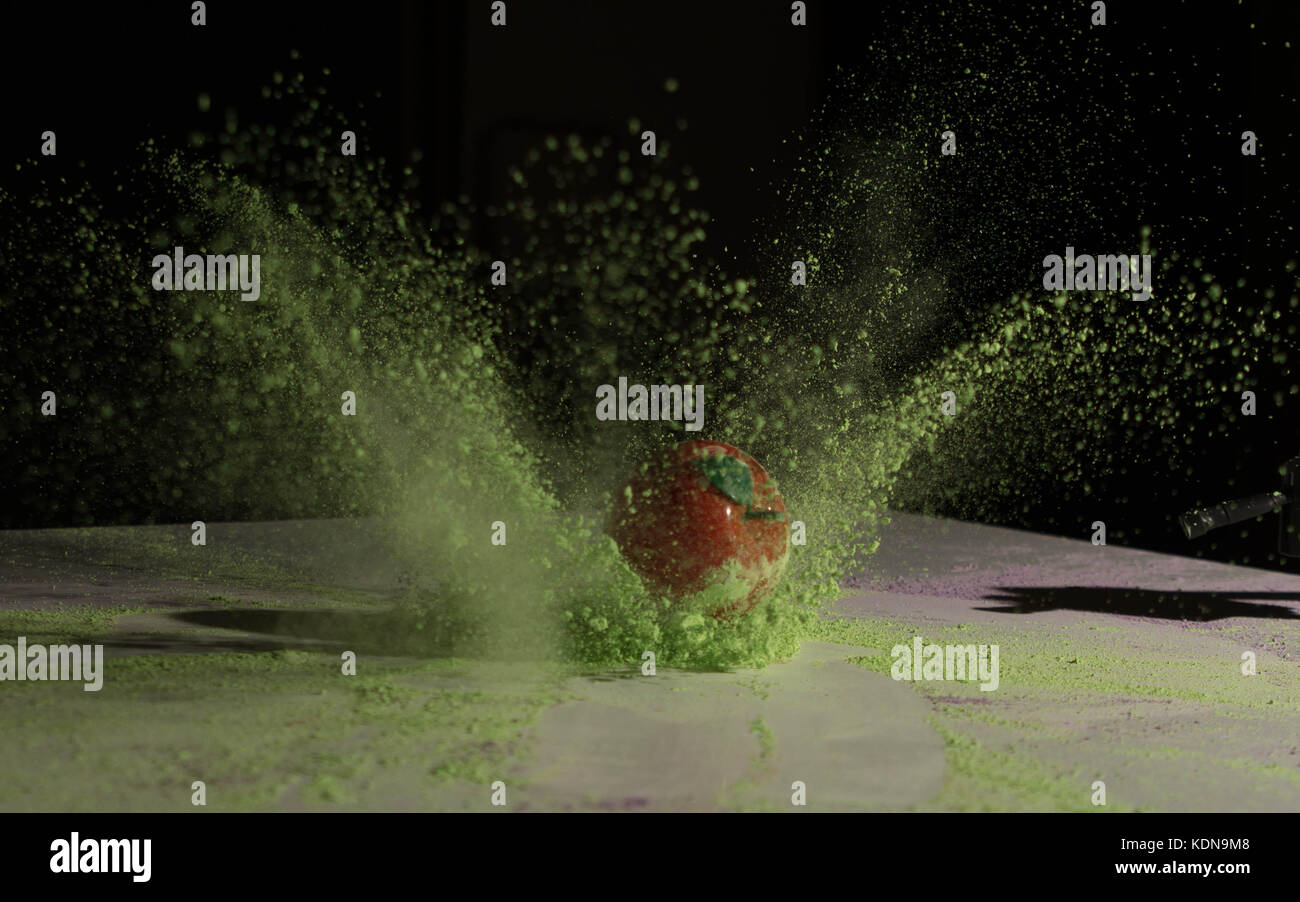 Slow motion ball hitting powder Stock Photo - Alamy