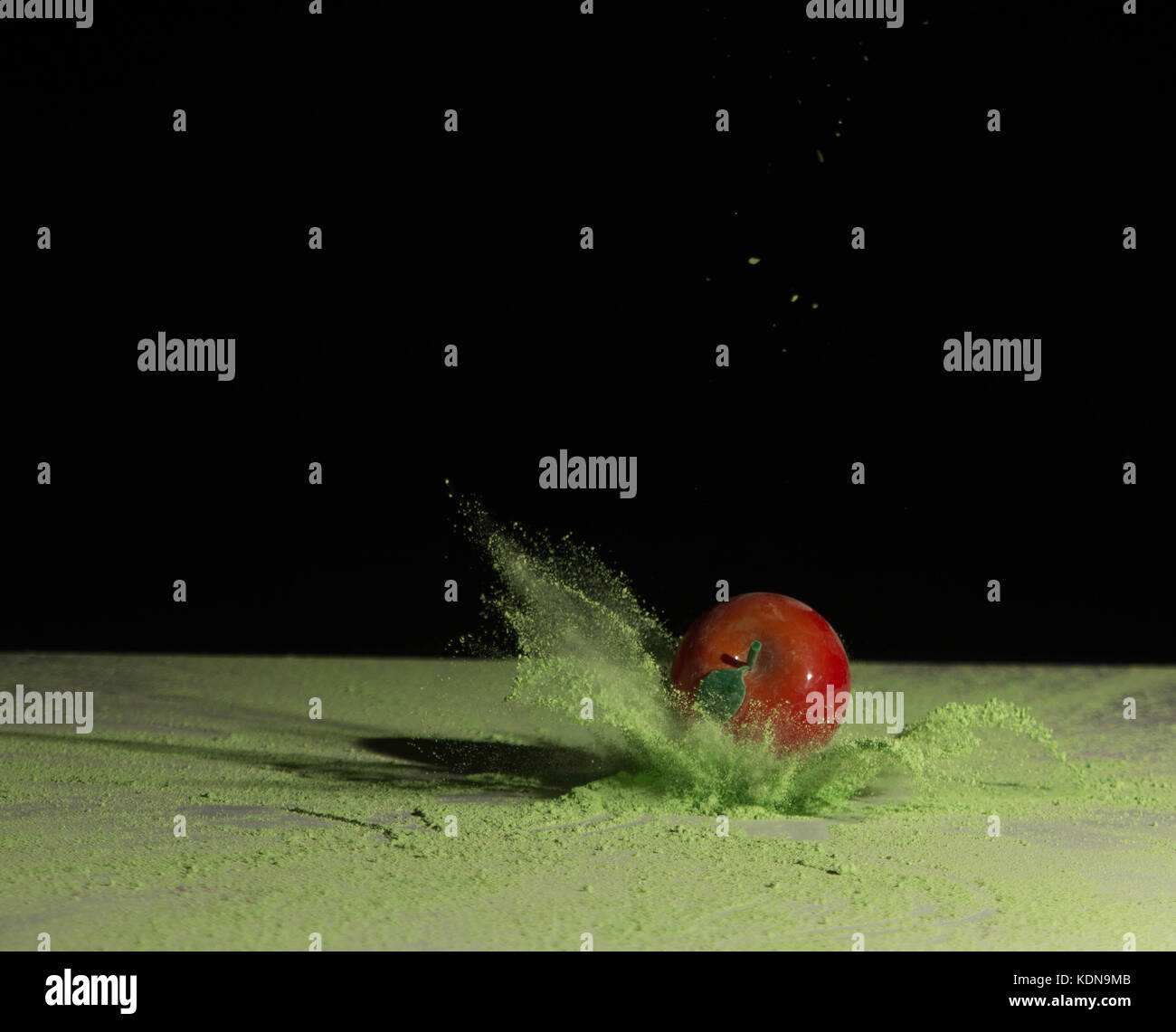 Slow motion ball hitting powder Stock Photo - Alamy
