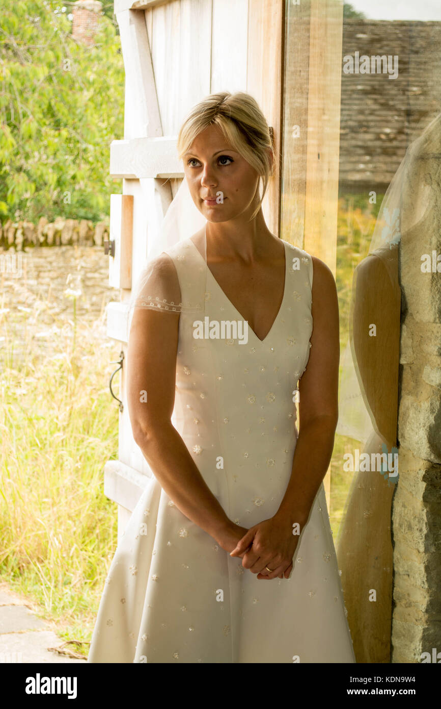 Bride in wedding dress Stock Photo - Alamy