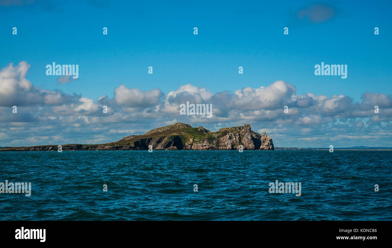 Island “Ireland Eye” just off the Howth, Irish sea. View from the sea ...