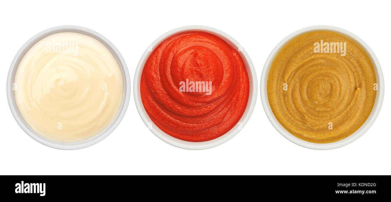 Ketchup, mayonnaise and mustard isolated on white background top view ...