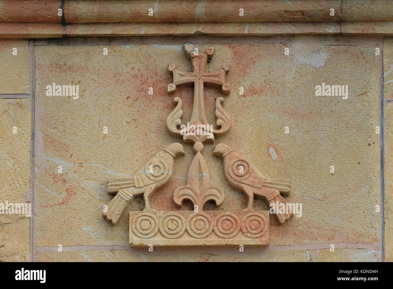 Greek orthodox cross relief at the bell tower of the Church of the ...