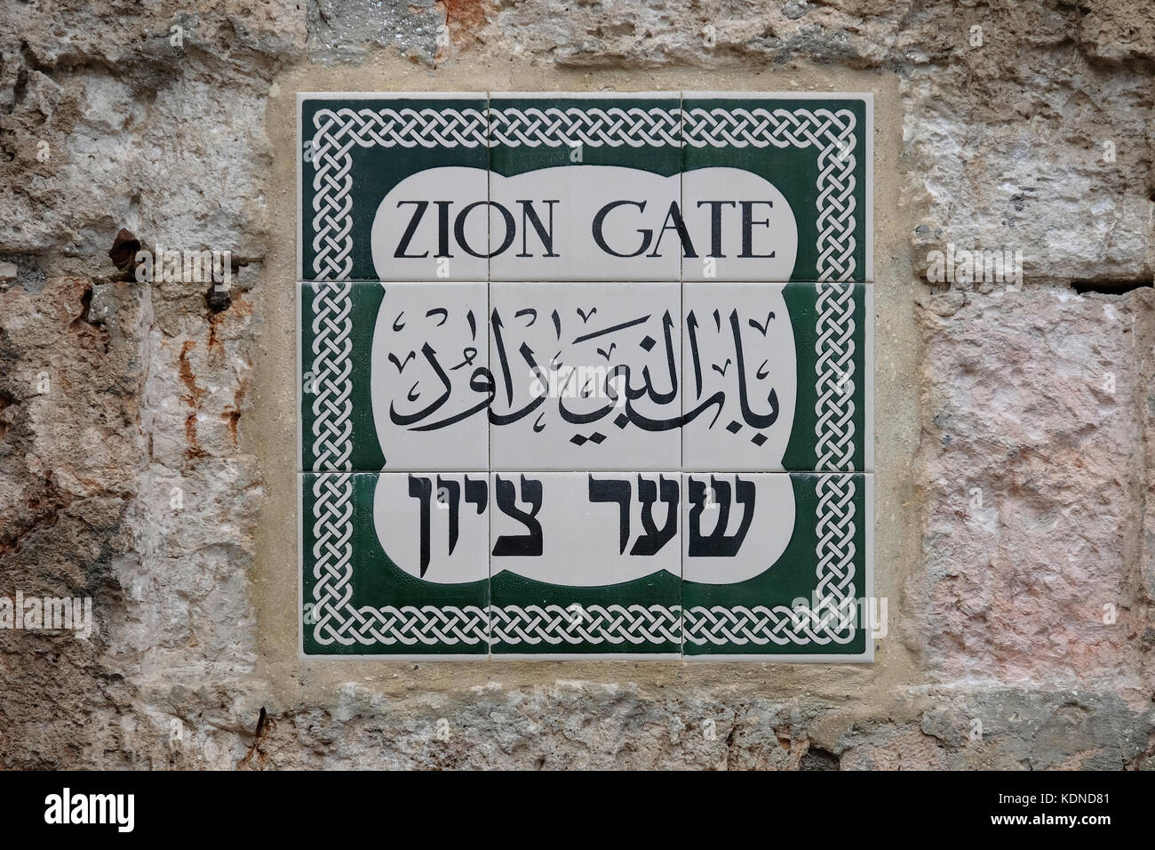 Sign on ceramic tiles in English Hebrew and Arabic at Zion Gate located ...