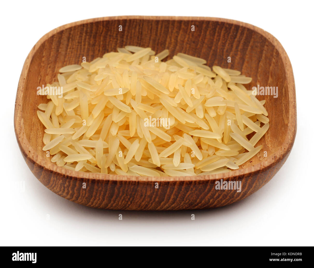 Basmati rice in a bowl over white background Stock Photo - Alamy