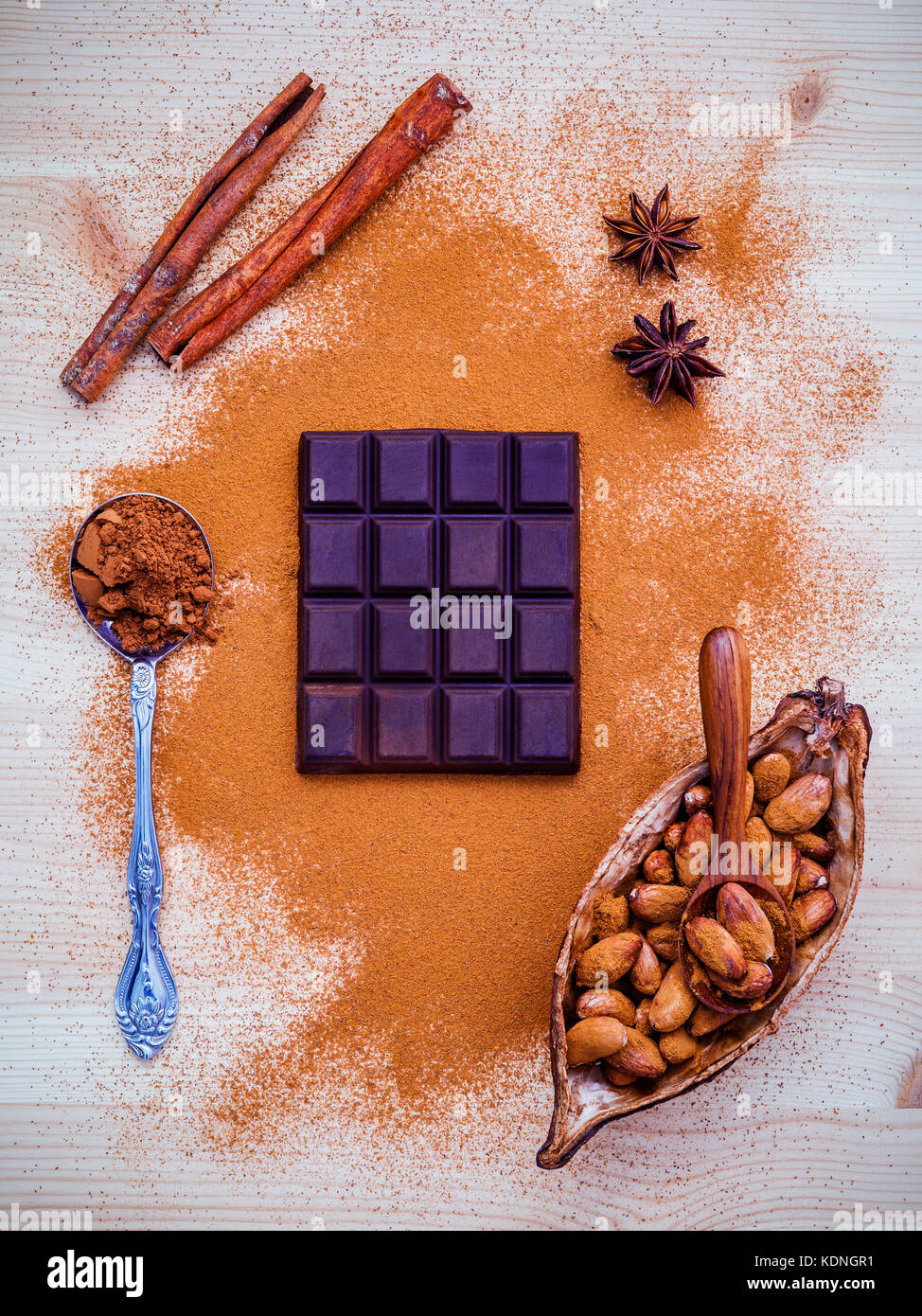 Desserts background and menu design. Brown chocolate powder in spoon ...