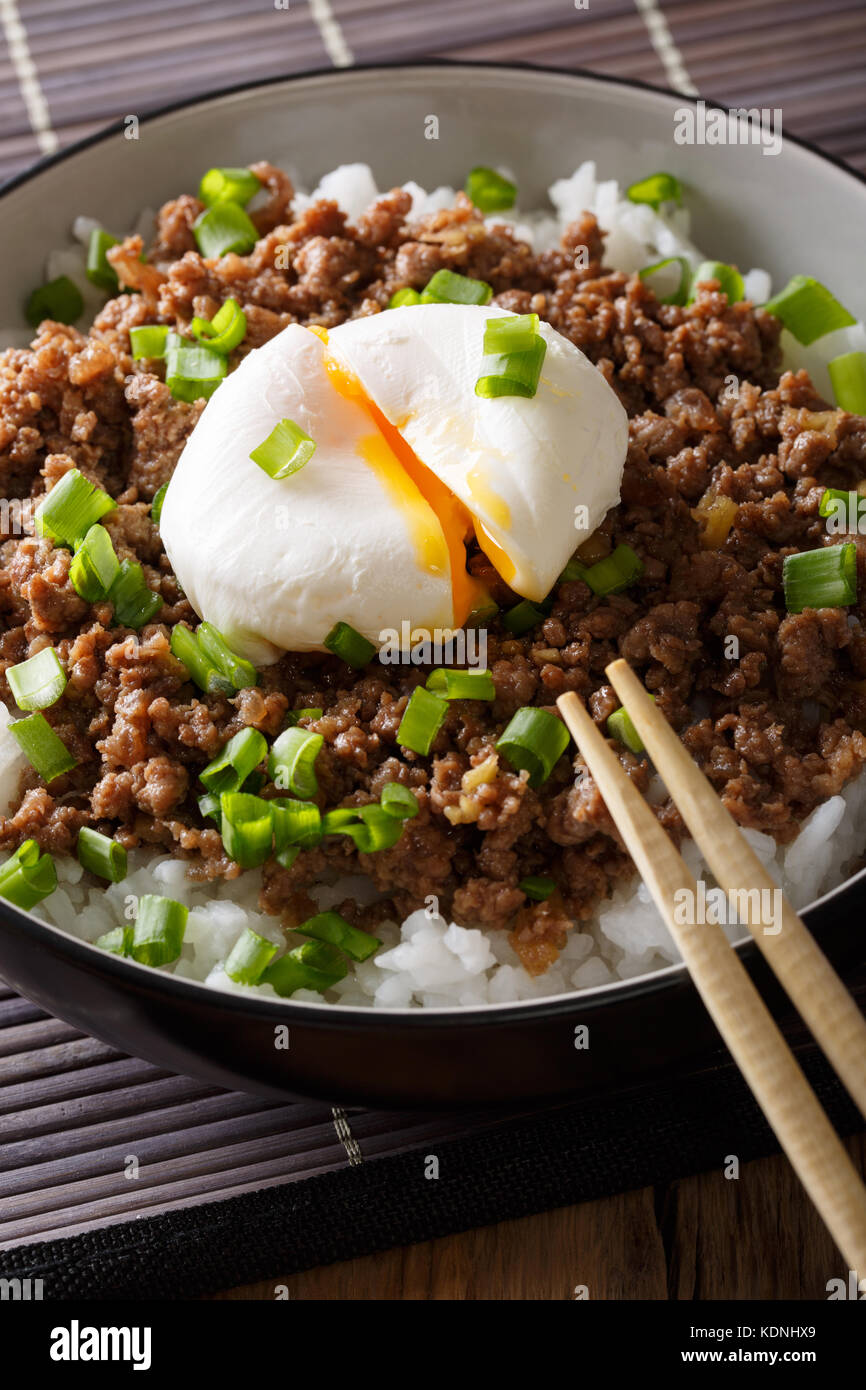Japanese spicy beef Soboro with egg benedict, rice and green onion ...