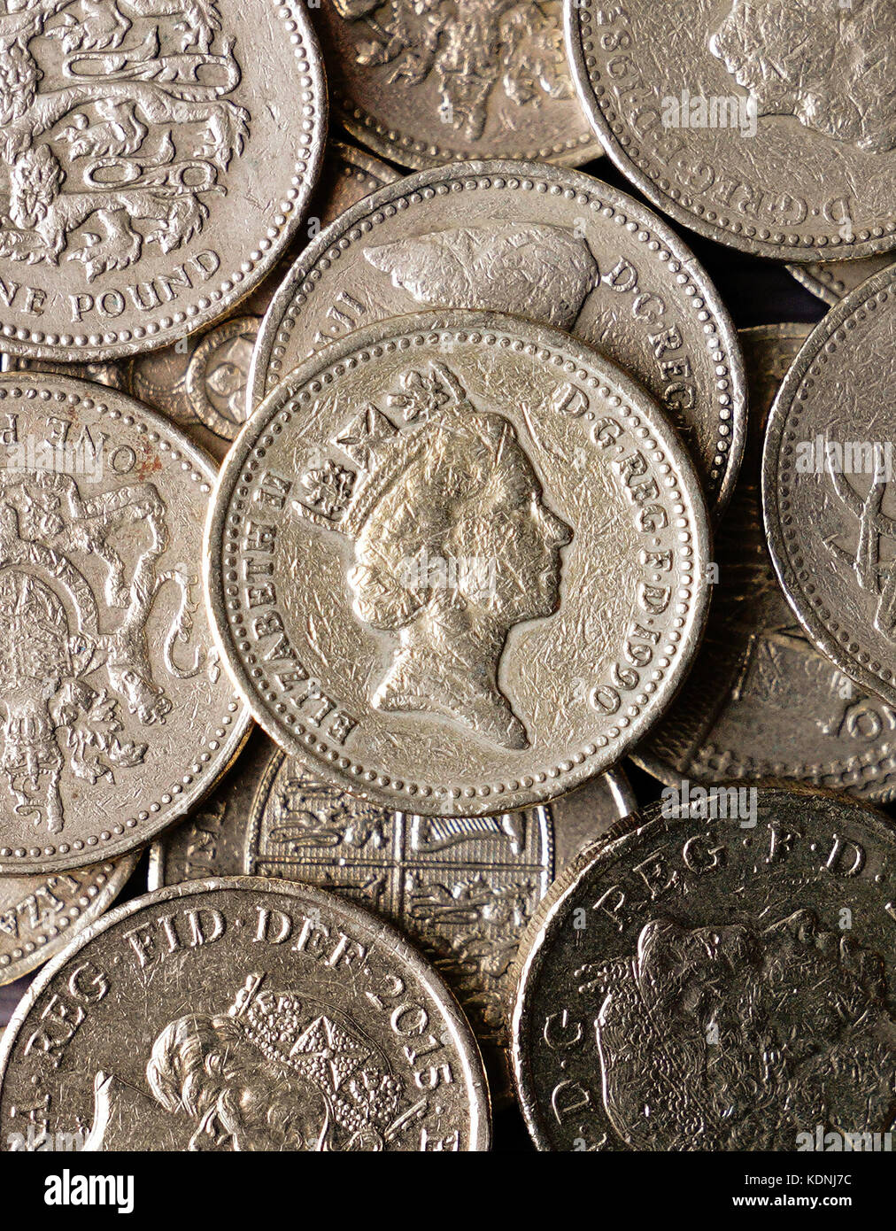 Examples of old £1 coins as from midnight on Sunday the round pound ...