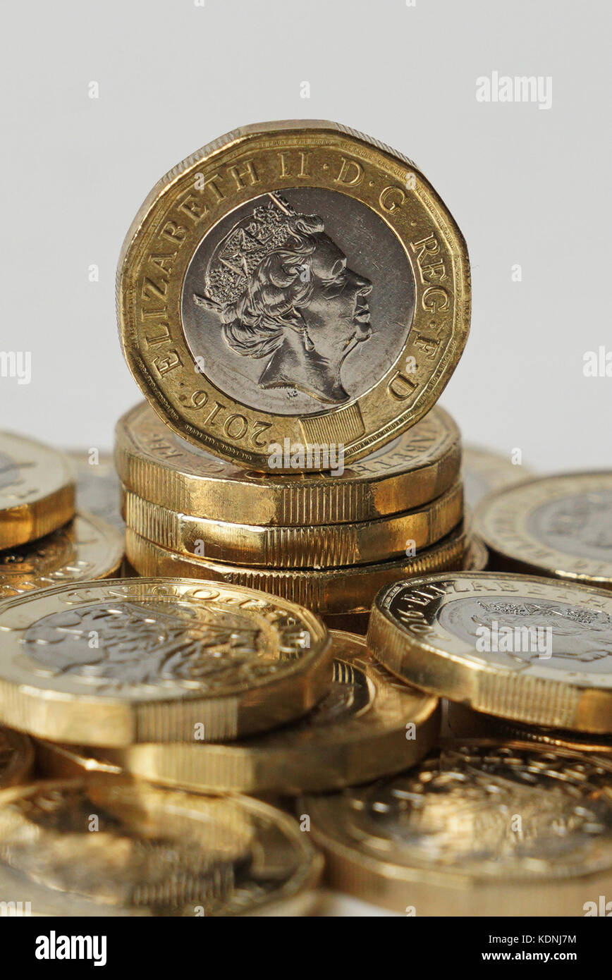 Examples of the new Â£1 coin as from midnight on Sunday the old round ...