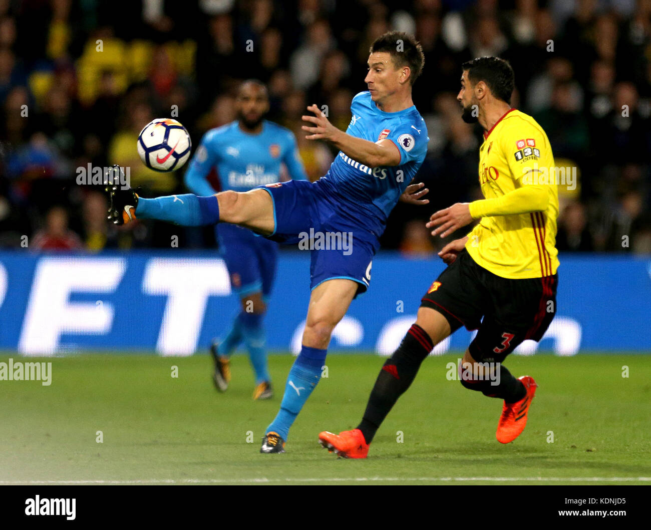 Arsenal's Laurent Koscielny (left) and Watford's Miguel Britos (right ...