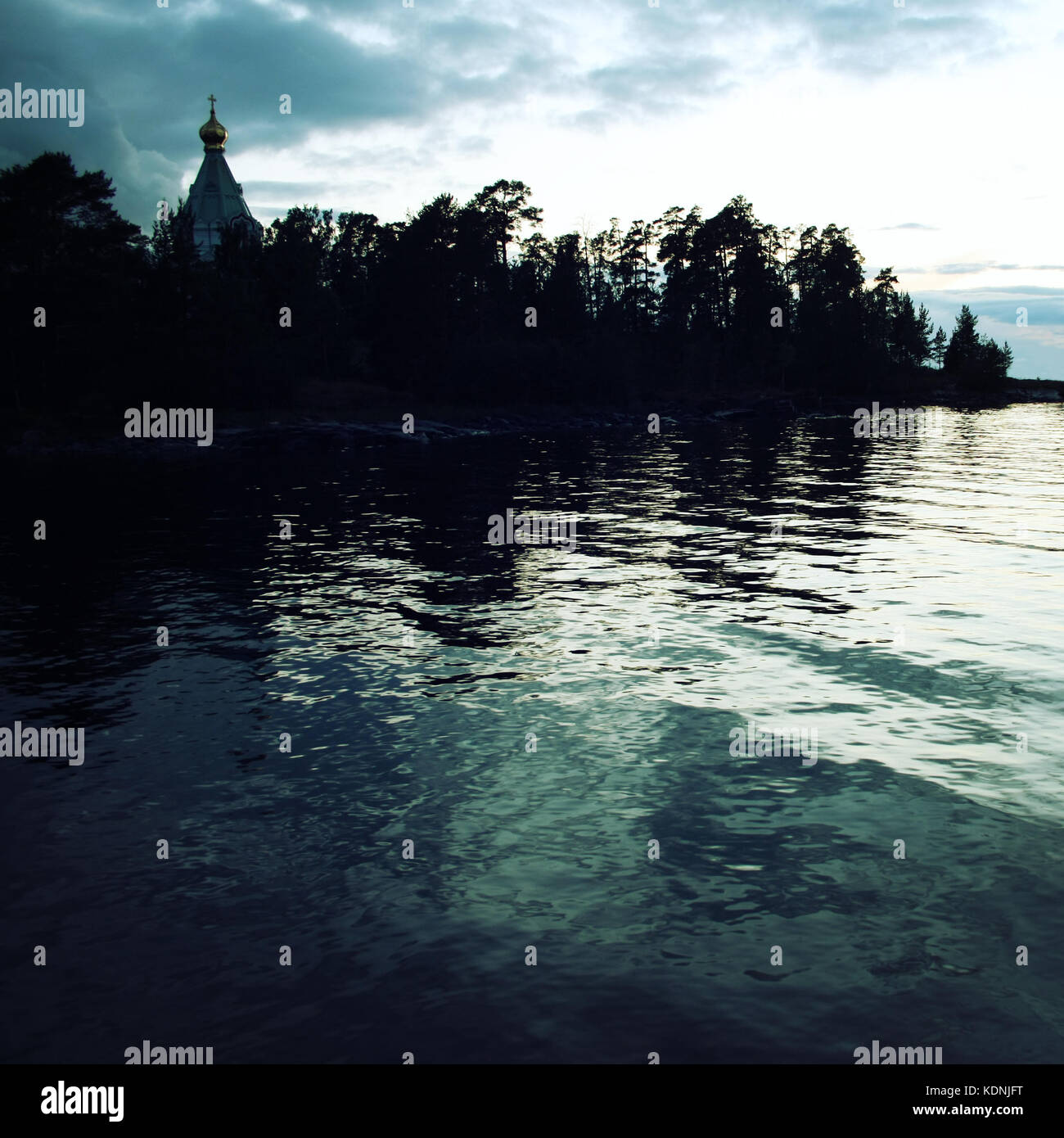 Ladoga lake. Late evening. Saint Nicholas's church on the island (skete ...