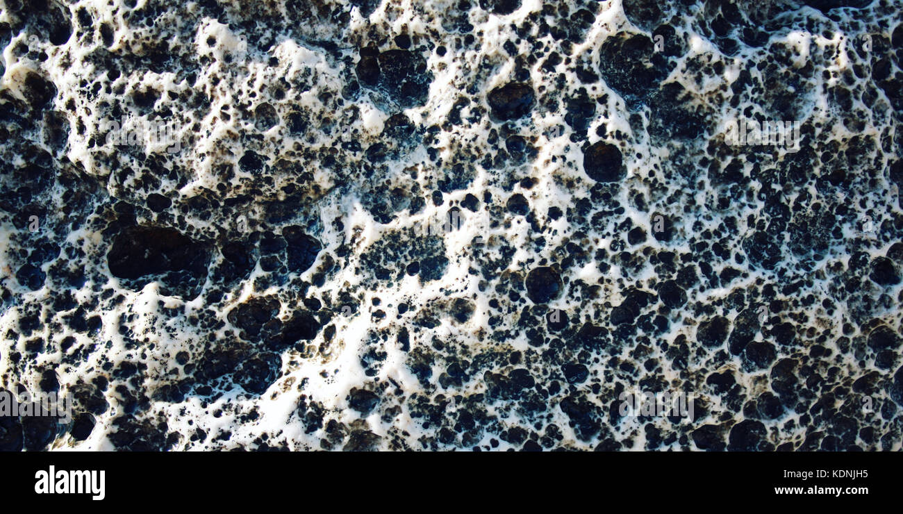 Magma background. Toned photo. Wide format. Porous rock texture. Black ...