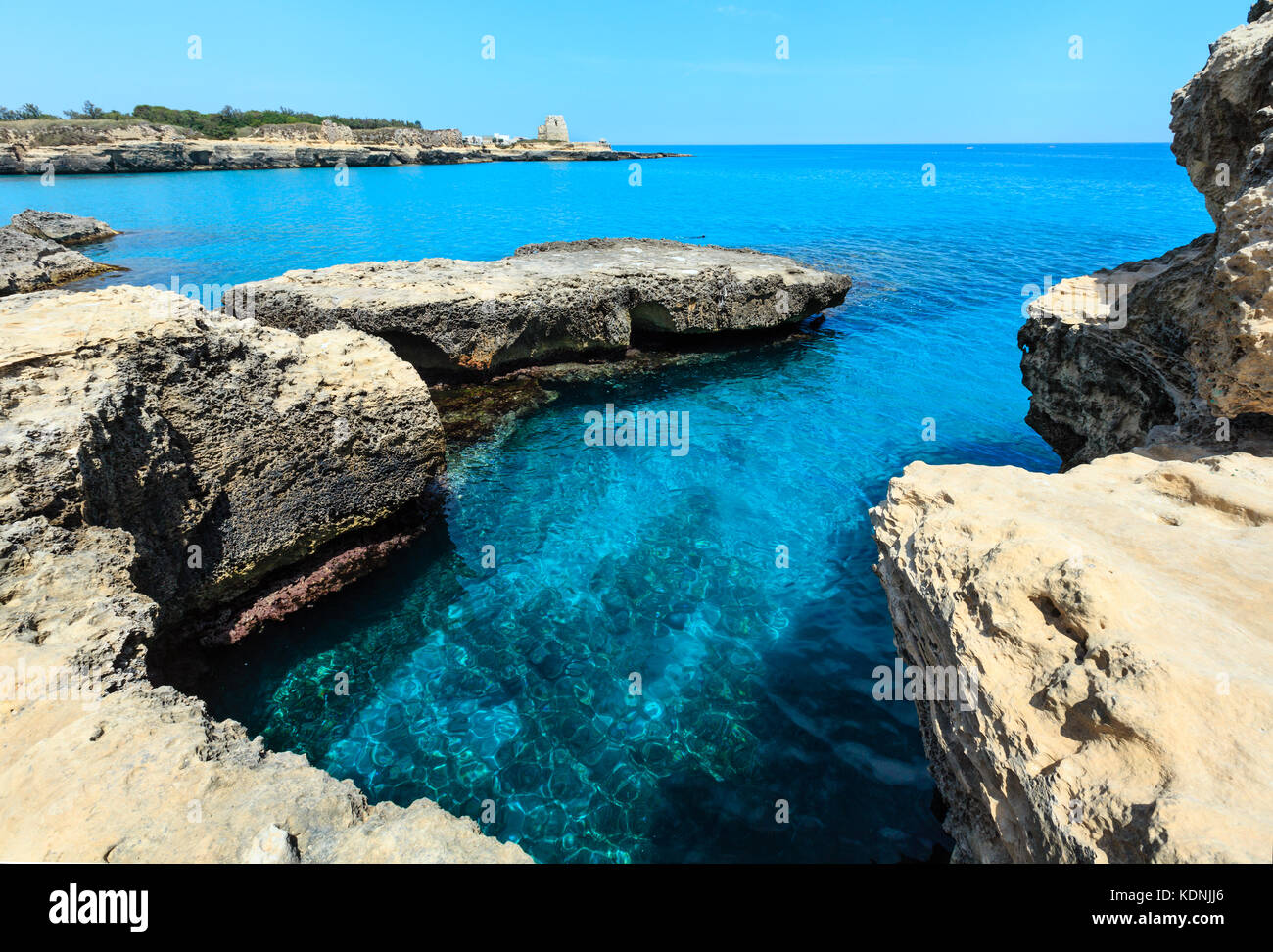 Picturesque seascape with white rocky cliffs, caves, sea bay and islets ...