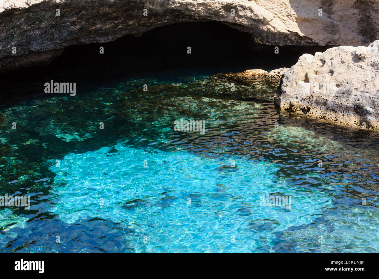 Picturesque seascape with white rocky cliffs, caves, sea bay and islets ...