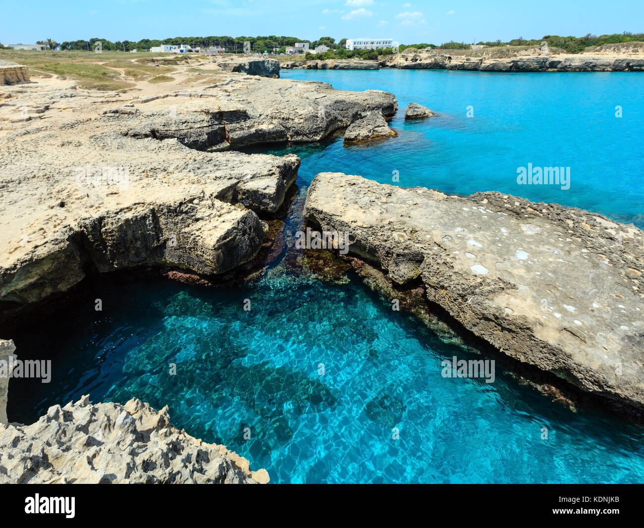Picturesque seascape with white rocky cliffs, caves, sea bay and islets ...