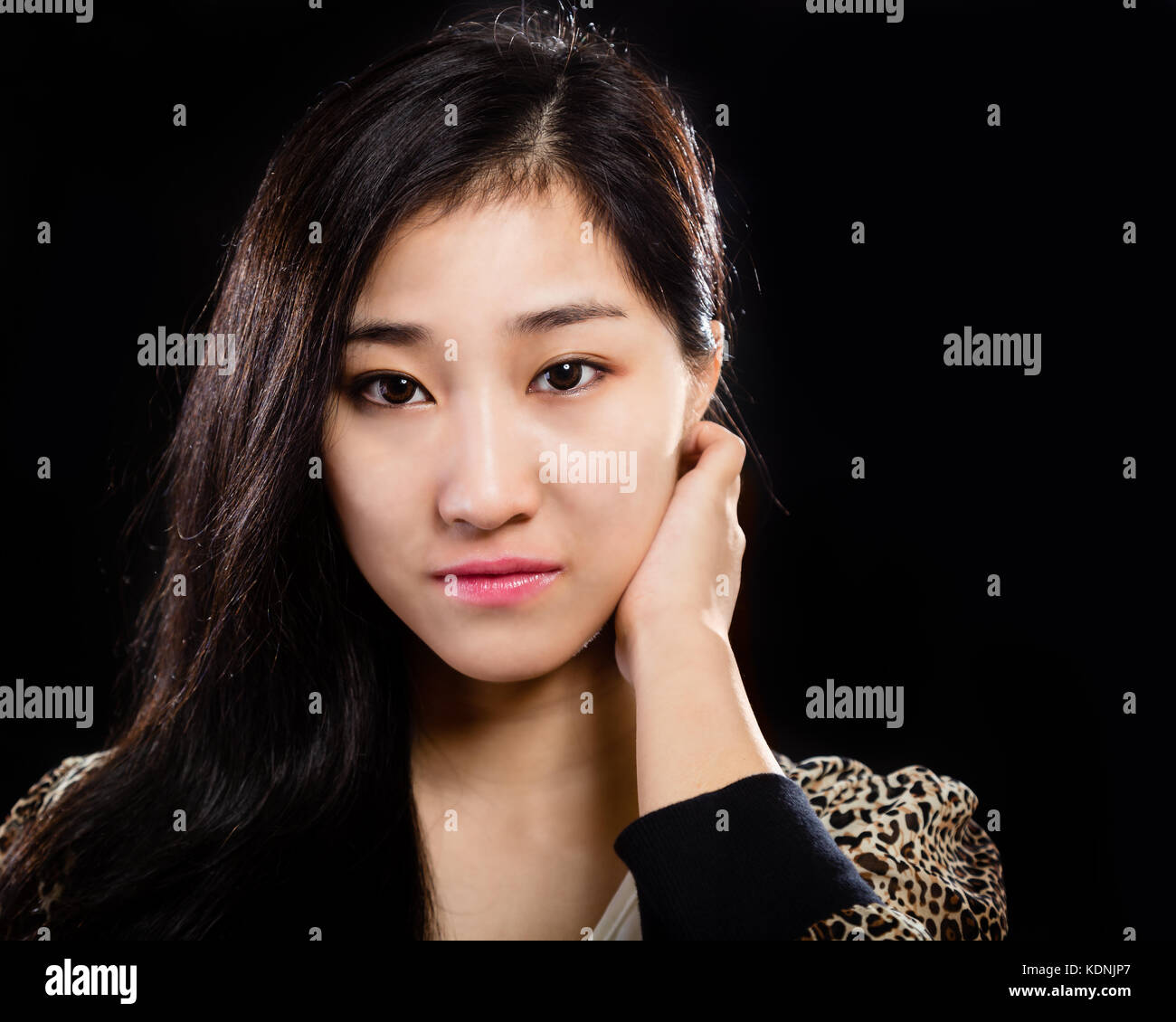 Portrait of Chinese girl, low key beauty lighting Stock Photo - Alamy