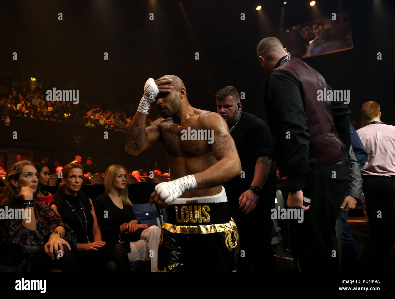 Louis Adolphe leaves the arena after being disqualified after knocking ...