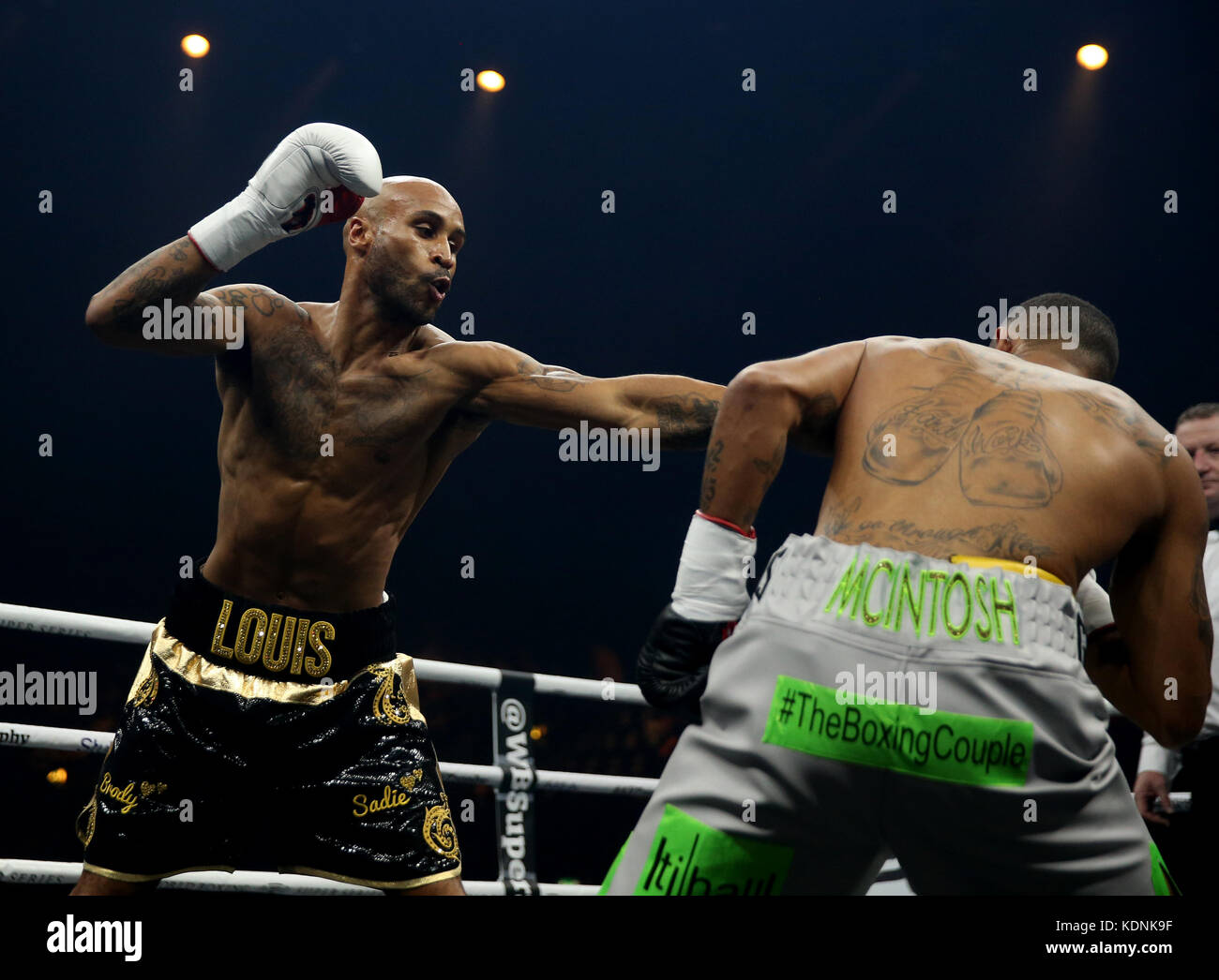 Louis Adolphe (left) against Nathan McIntosh in the Welterweight bout ...