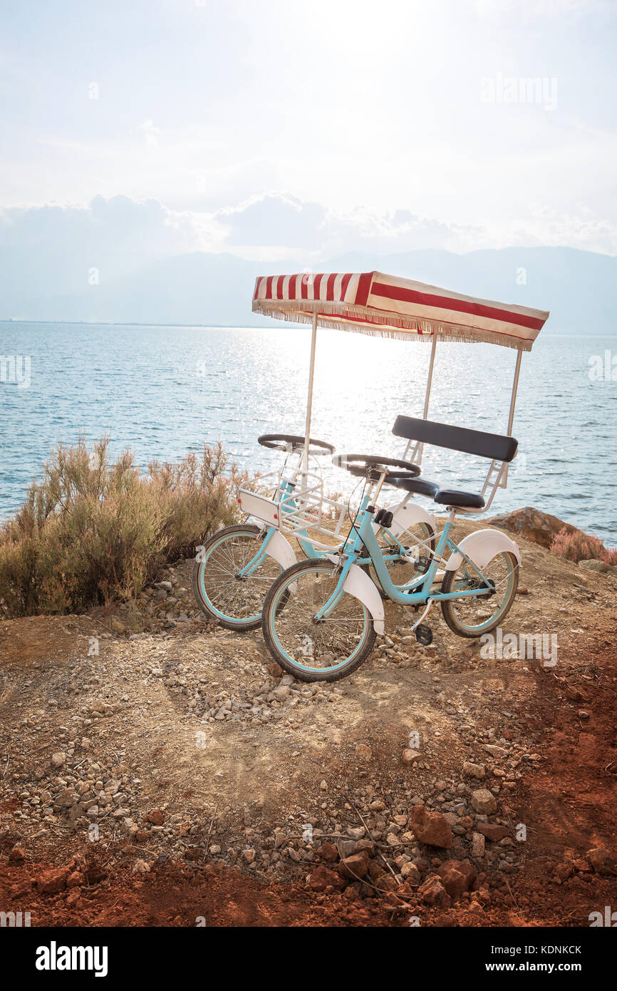 Pair bicycle beside the sea Stock Photo - Alamy