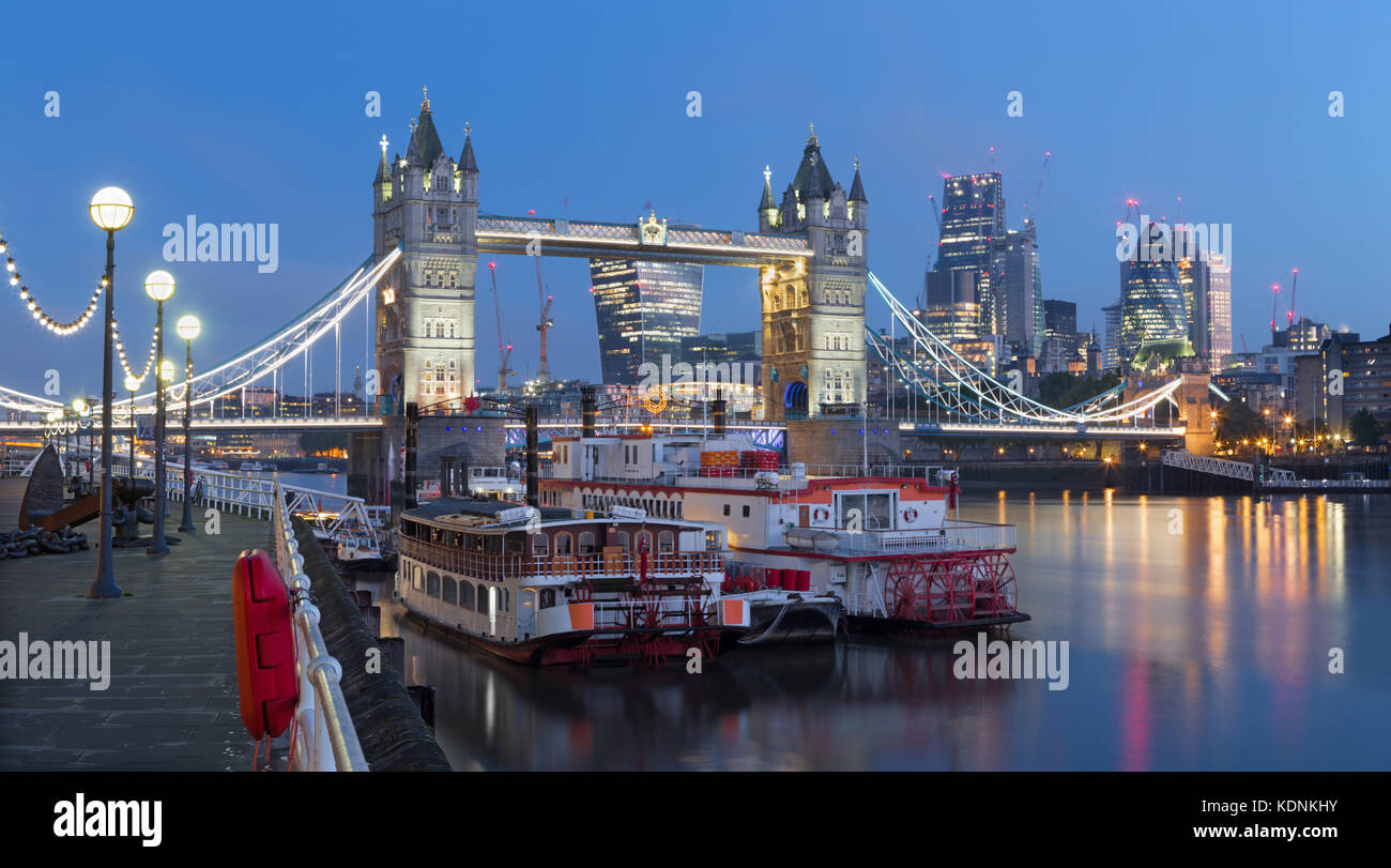 London - The Tower Bride, promenade and skyscrapers at dusk Stock Photo ...