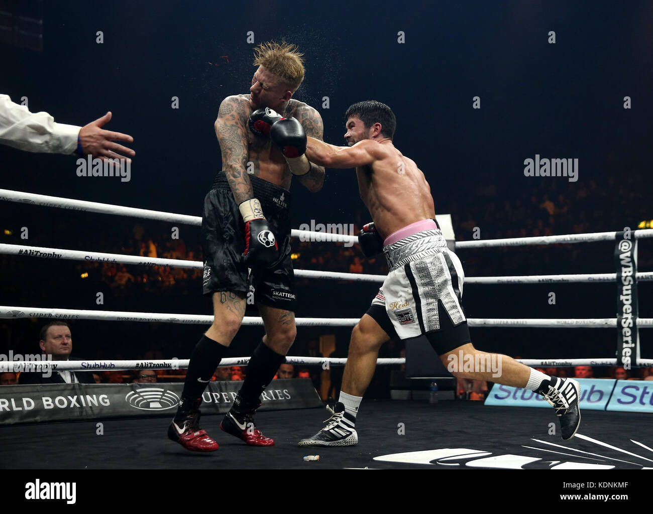 John Ryder (right) knocks down Patrick Nielsen in the Super ...