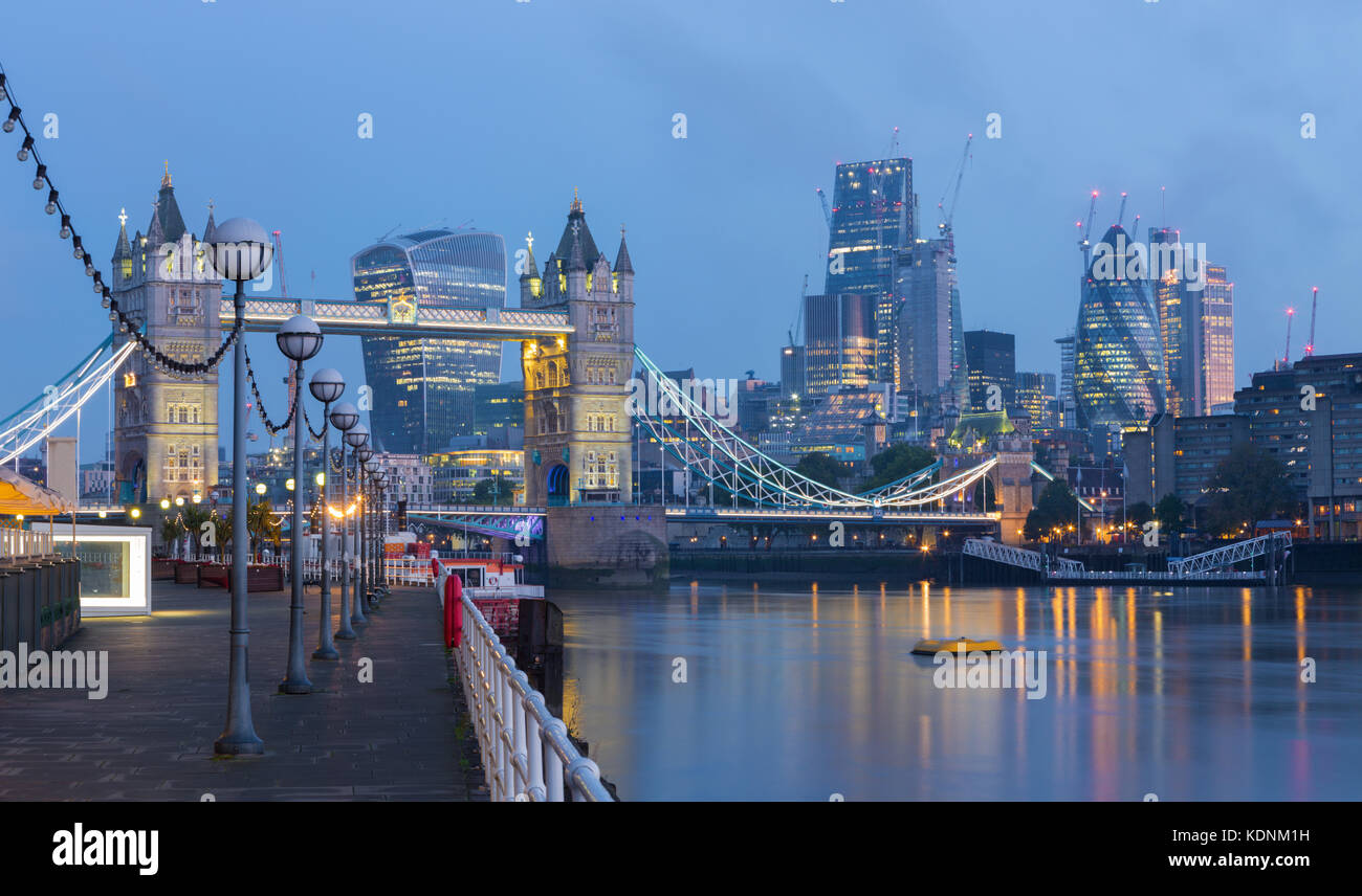 London - The Tower Bride, promenade and skyscrapers at dusk Stock Photo ...