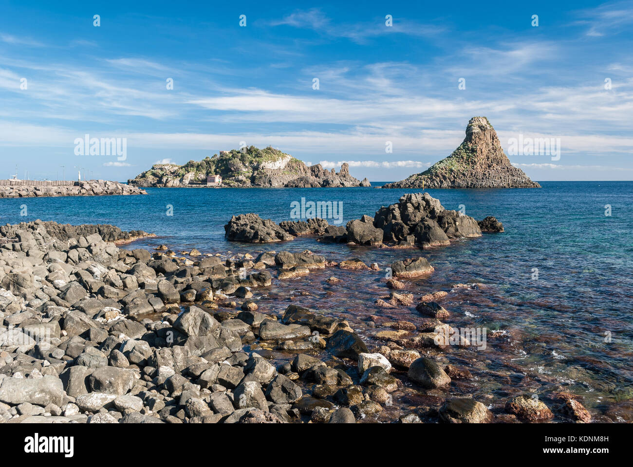 Island Lachea and a sea stack, geological features in Acitrezza (Sicily ...