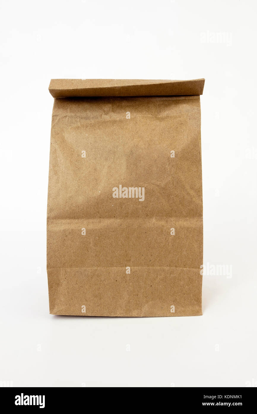 Front view of sack lunch. Isolated. Vertical Stock Photo - Alamy