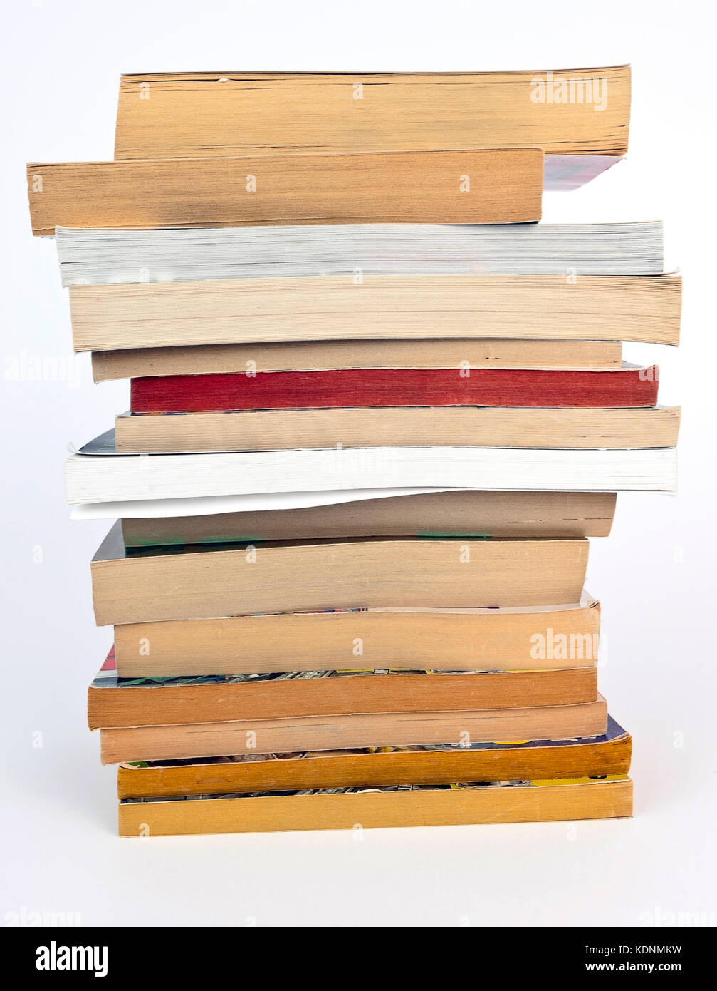 Books irregularly stacked Stock Photo - Alamy