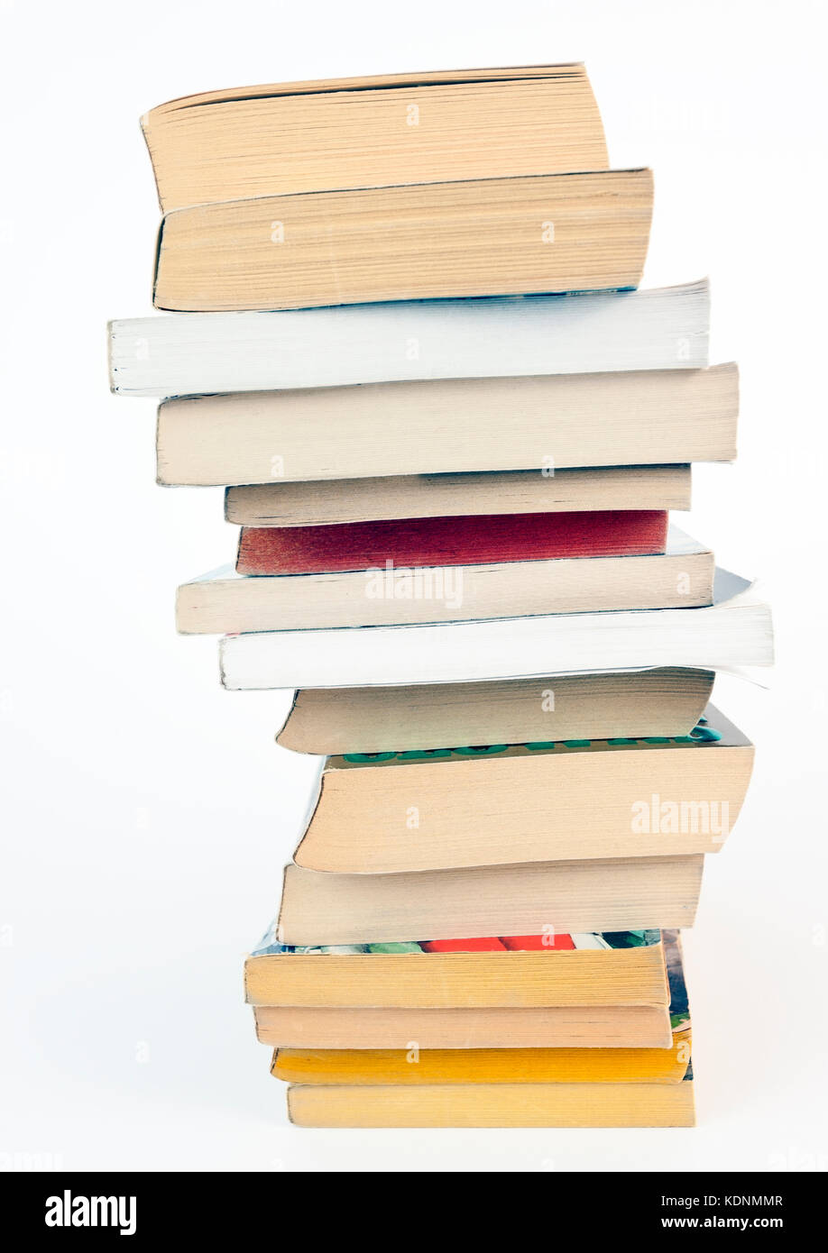 Books irregularly stacked Stock Photo - Alamy