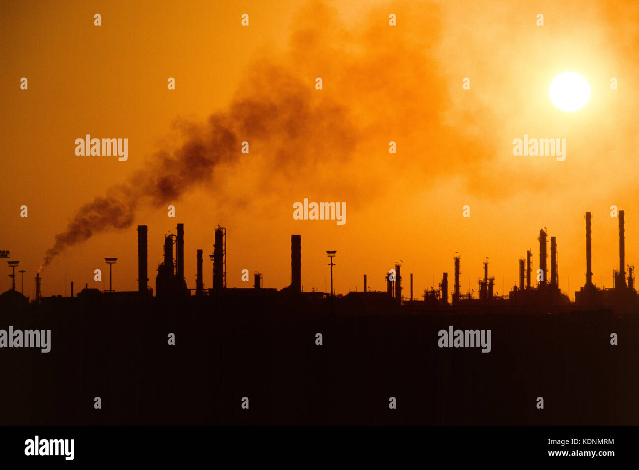 Riyadh oil refinery at sunset Stock Photo - Alamy