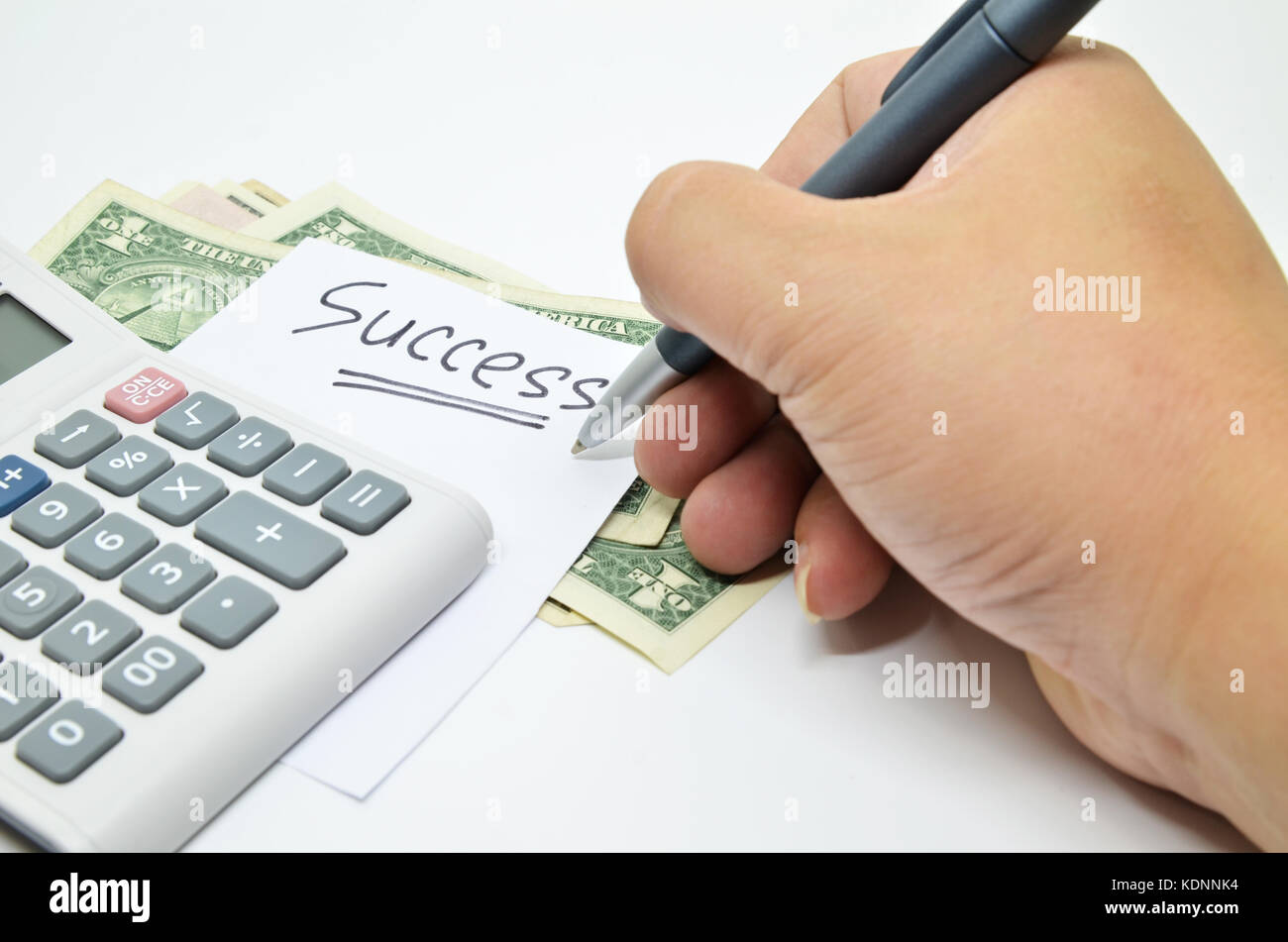 Hand written success word on paper. Business success concept Stock ...