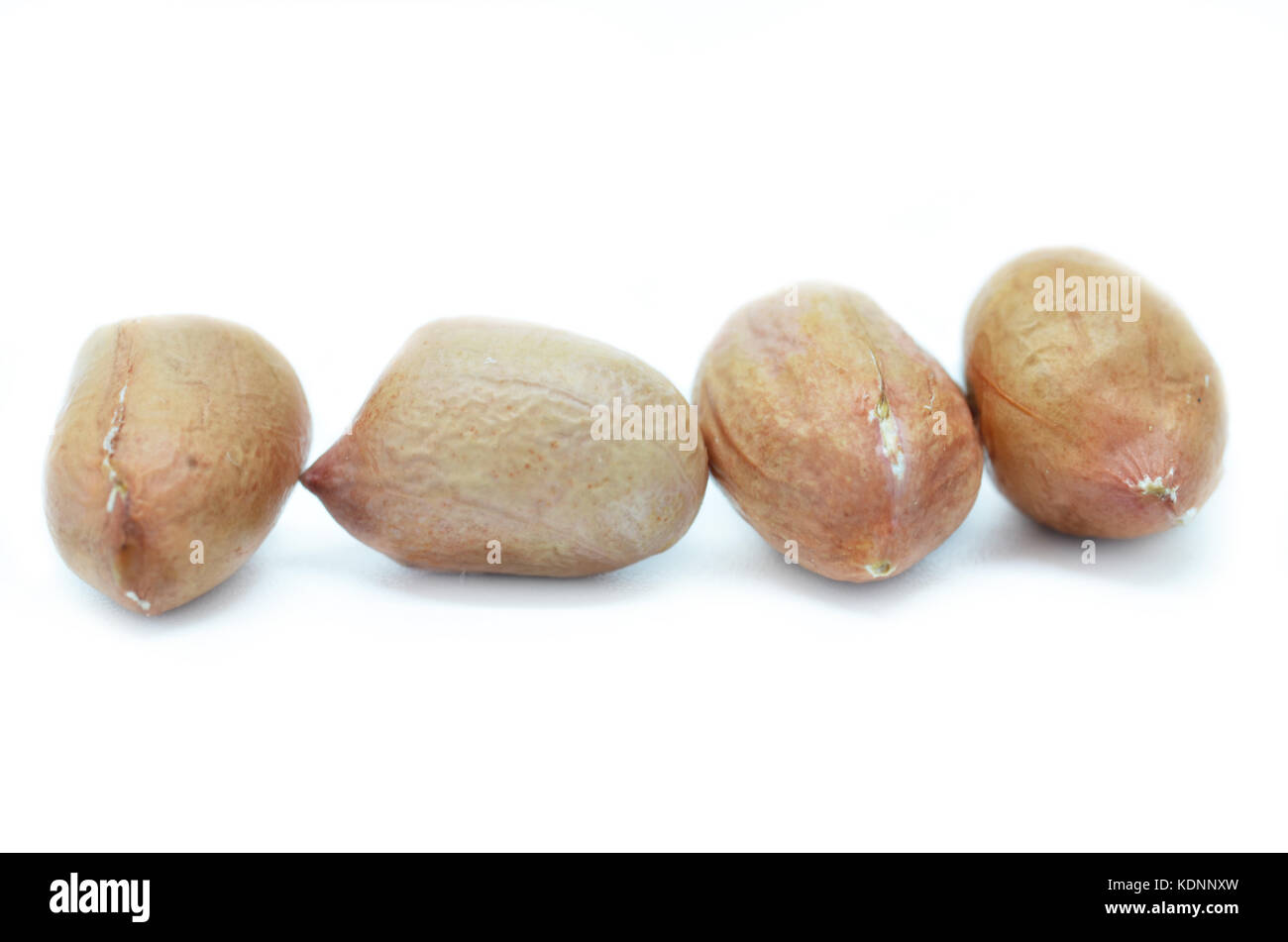 Processed peanuts isolated on a white background Stock Photo - Alamy