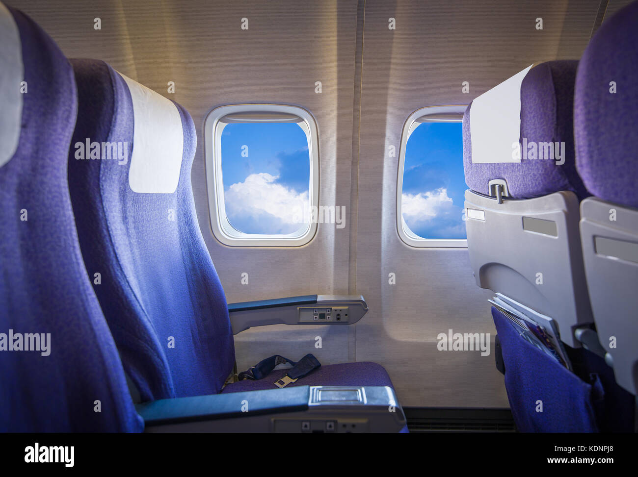 View of the sky and clouds with sunlight from the airplane window,empty ...