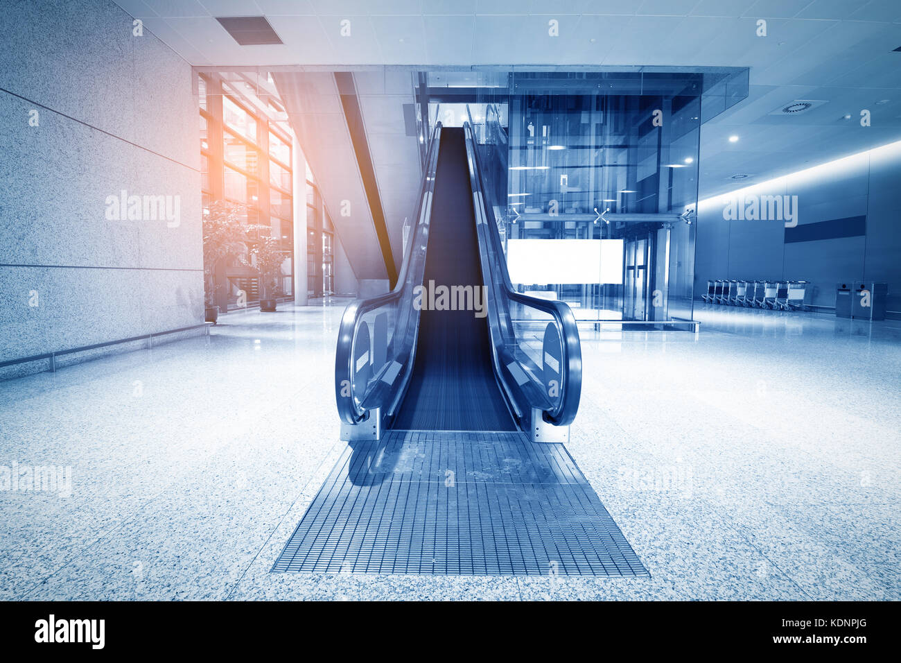 escalator,Up and down escalators in public building Stock Photo - Alamy