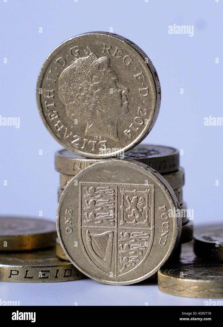 Examples of the old 1 pound coins as from midnight on Sunday the round ...