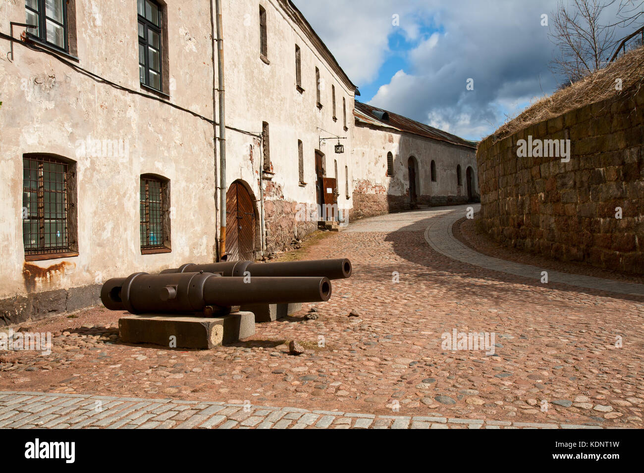 Two ancient guns in courtyard Vyborg Castle Stock Photo - Alamy