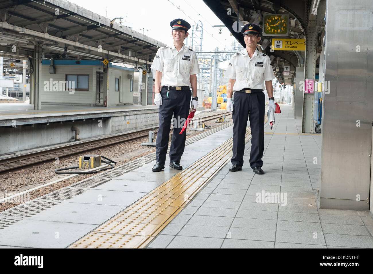 Kyoto Japan Sept 4 2017: Railway staff await the next train ; the ...