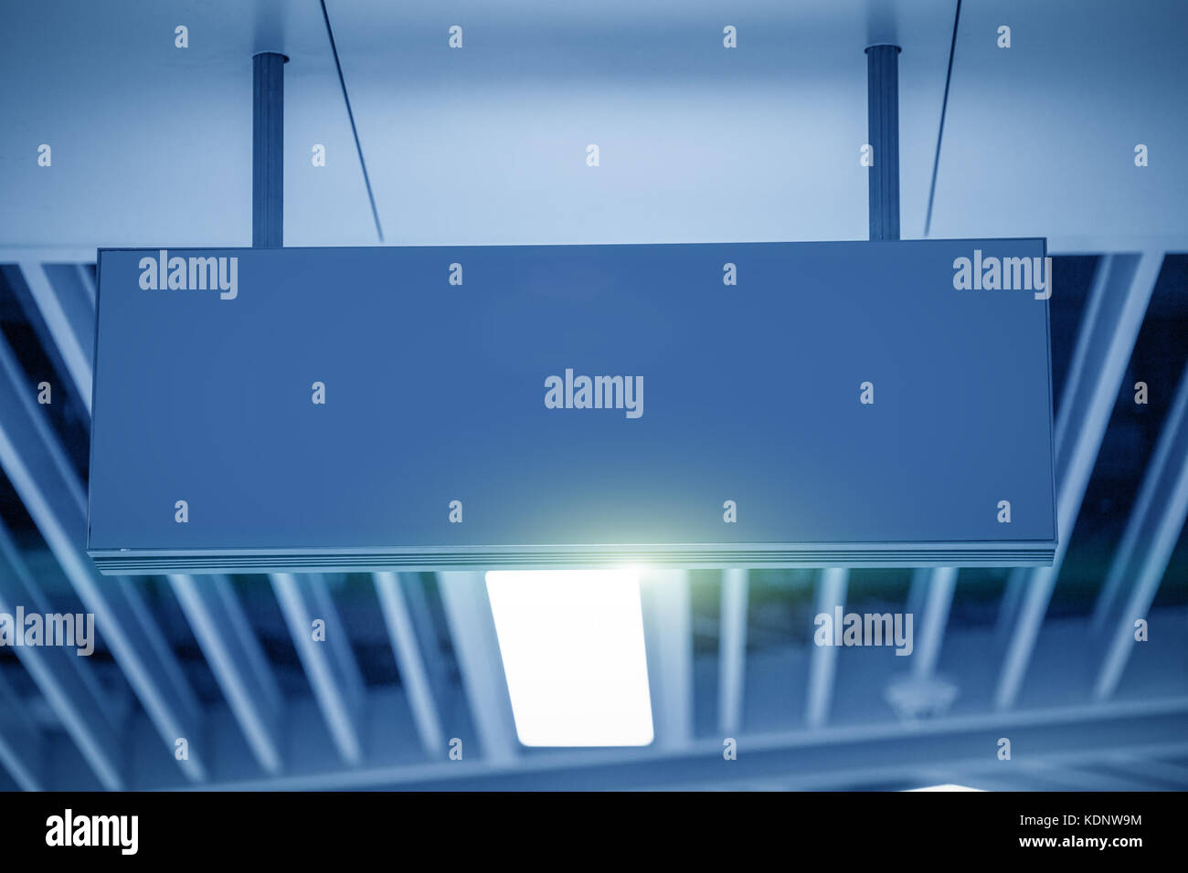Illuminated Corporate Office Exit Sign Closeup Stock Photo - Alamy