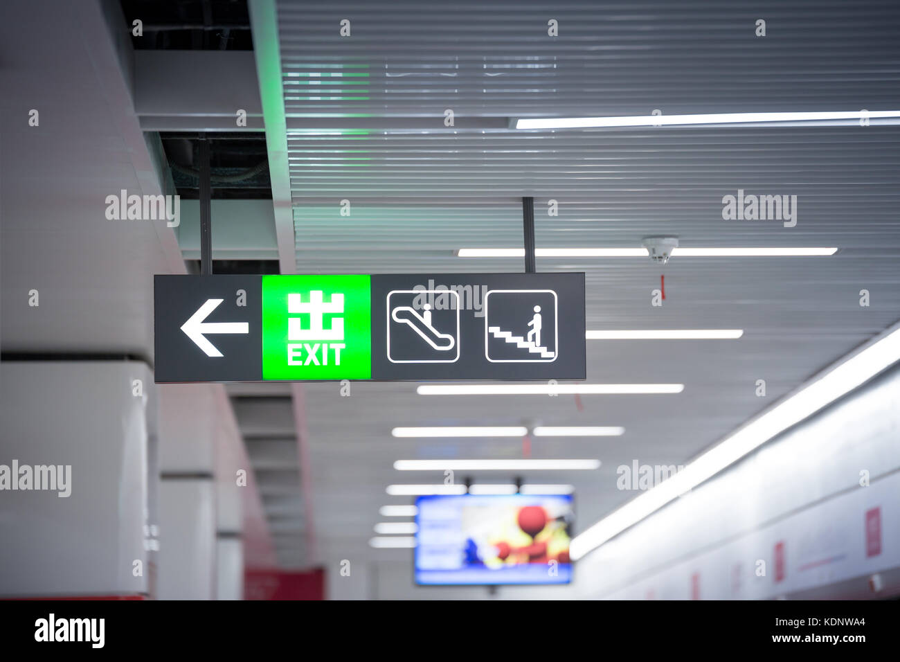 Illuminated Corporate Office Exit Sign Closeup Stock Photo - Alamy