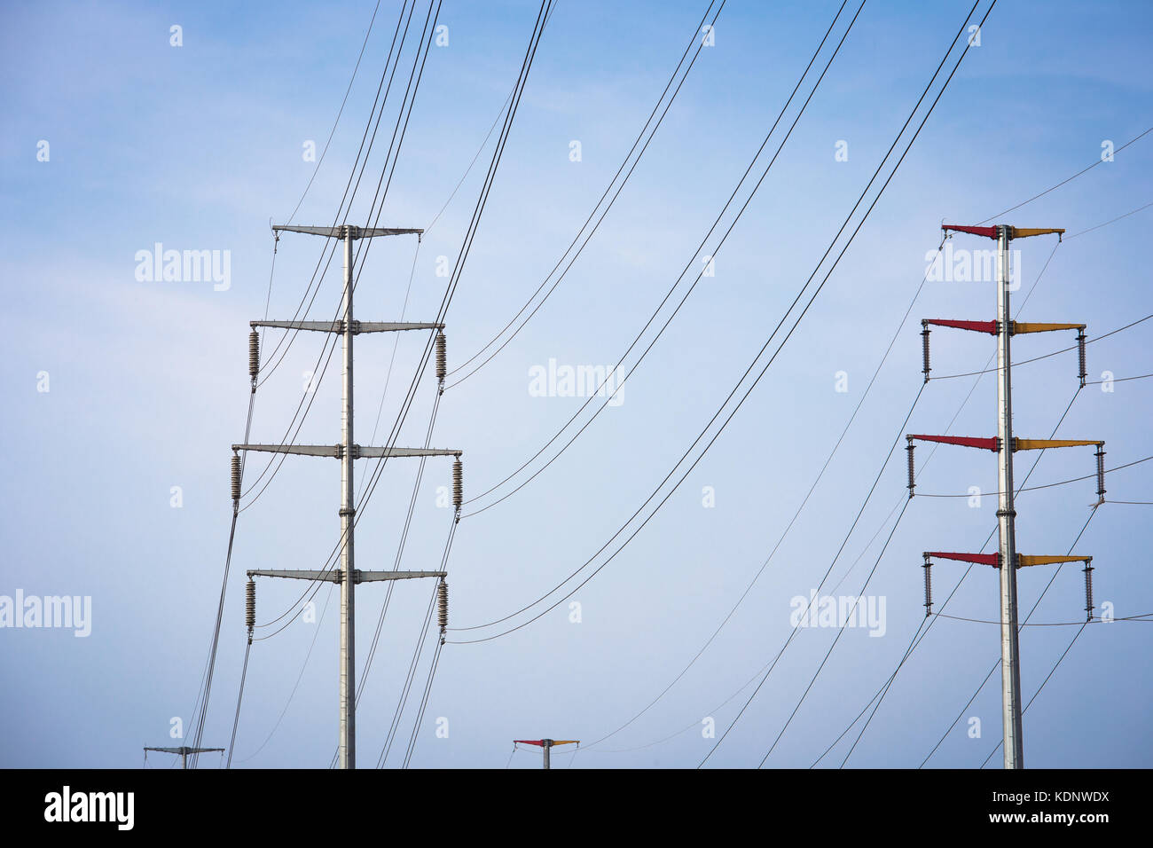Large view on the powerlines on the field Stock Photo - Alamy
