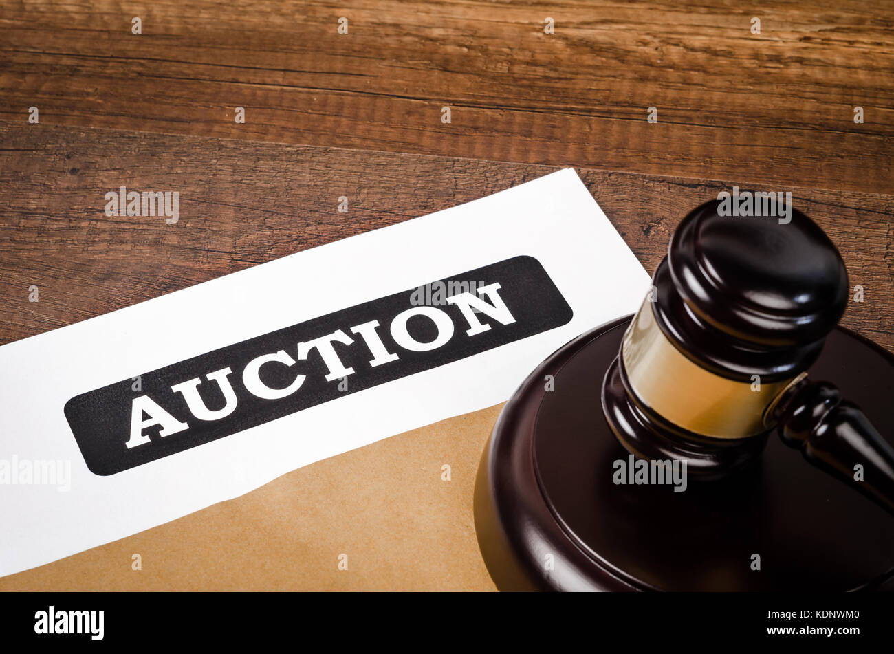 Auction document with wooden gavel. Business concept Stock Photo - Alamy
