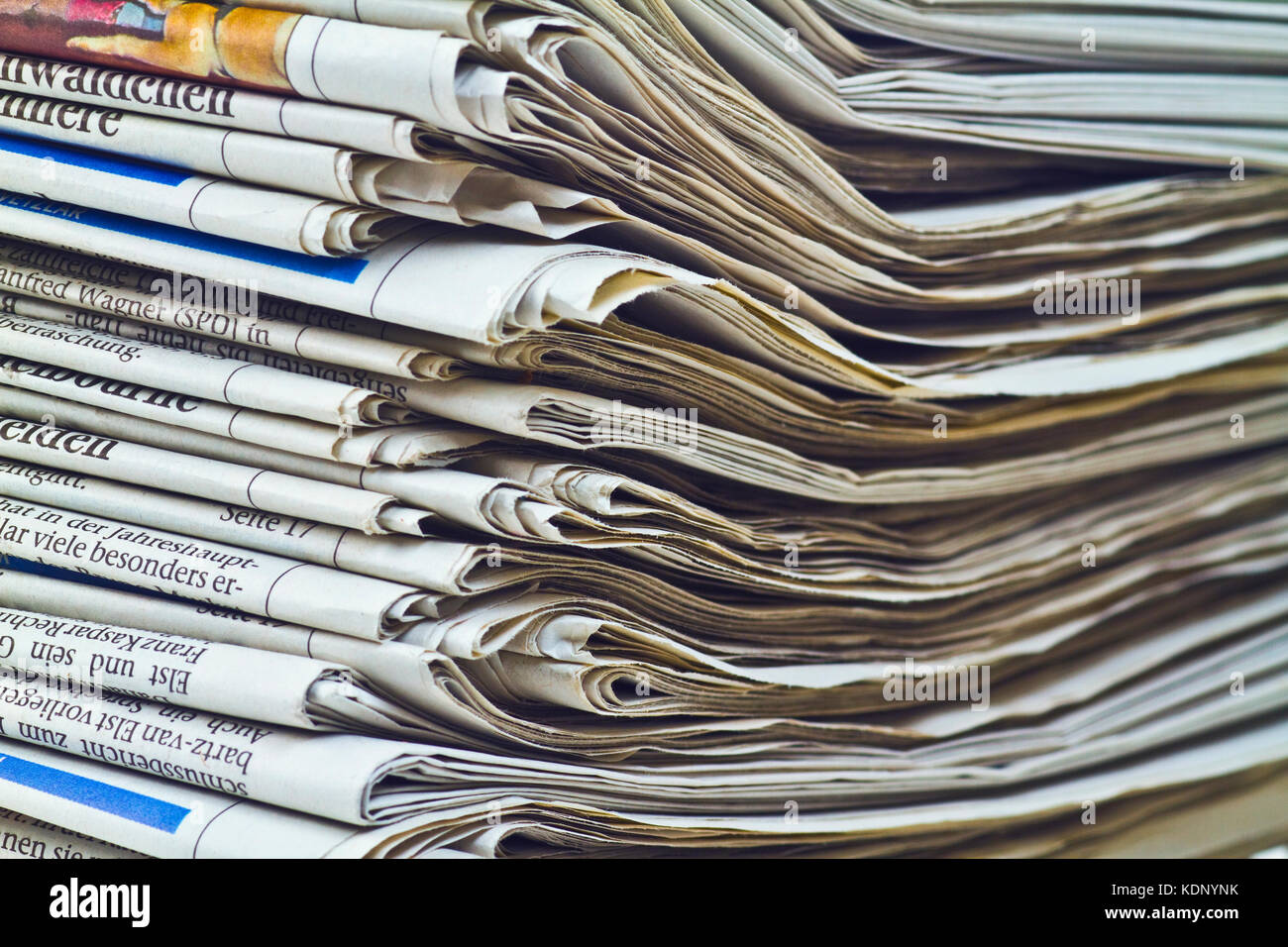 Image of a stack of newspaper Stock Photo - Alamy