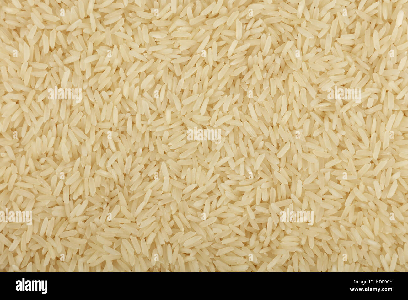 White Thai Jasmine long grain rice close up pattern background ...